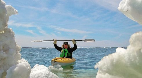 Local photographer takes a kayak tour among Lake Huron icebergs ...